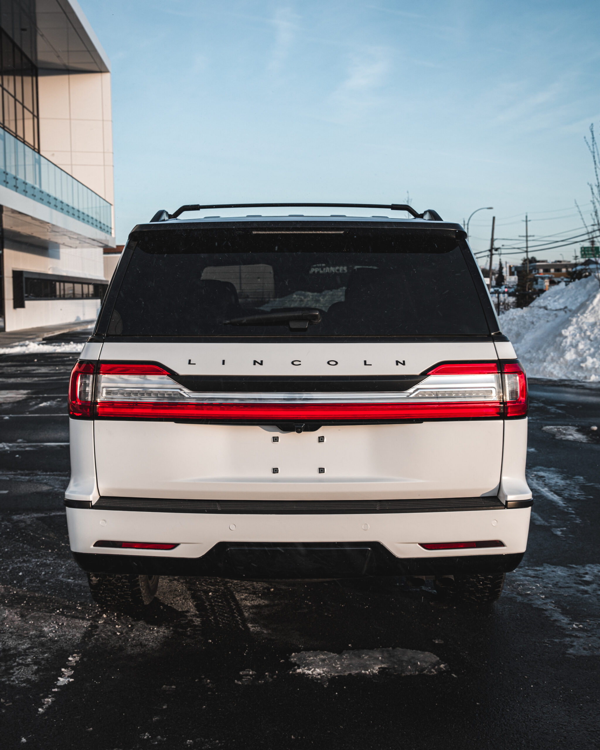 Lincoln Navigator Wrapped in Matte Pearl White + Chrome Delete - MK Wrapz